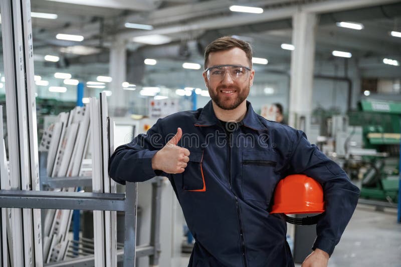 Break Time, Standing. Factory Worker is Indoors with Hard Hat Stock ...