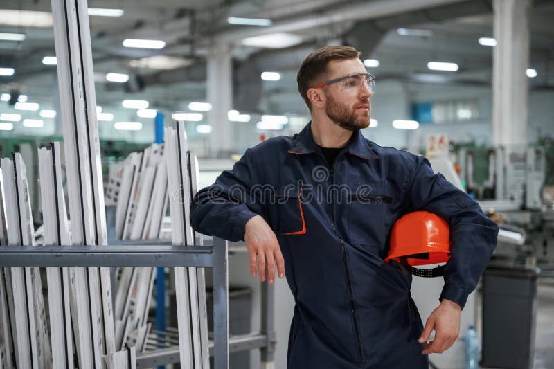 Break Time, Standing. Factory Worker is Indoors with Hard Hat Stock ...