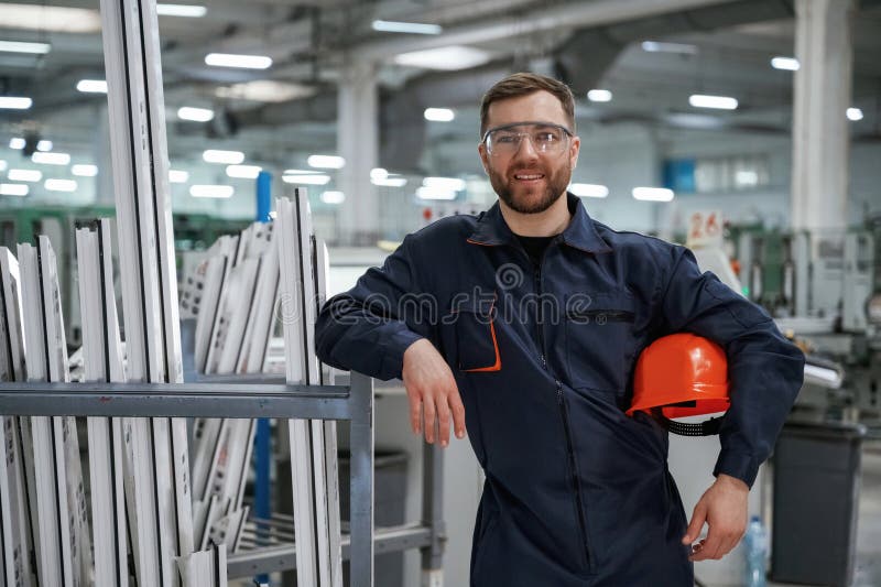 Break Time, Standing. Factory Worker is Indoors with Hard Hat Stock ...
