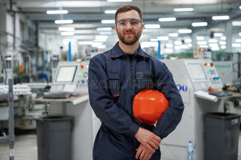 Break Time, Standing. Factory Worker is Indoors with Hard Hat Stock ...