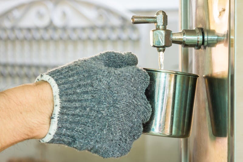 Break from Work and Take Water from the Cooler. Stock Photo - Image of ...