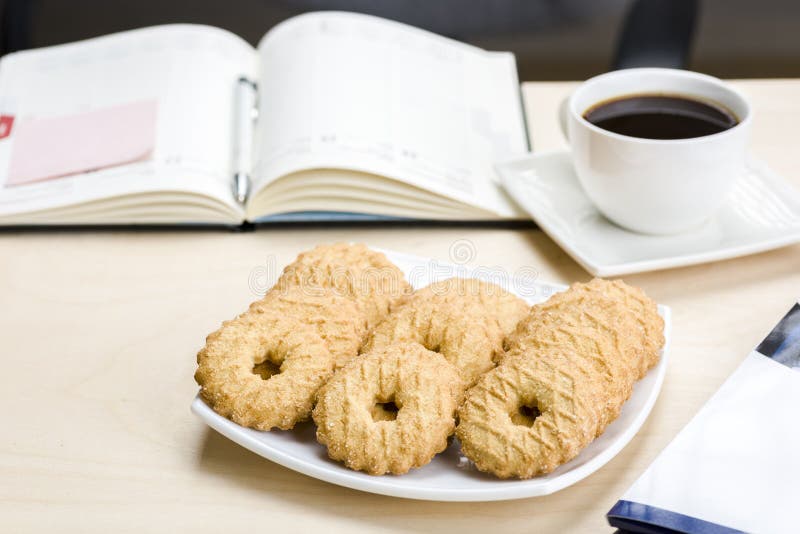 A Break at Work - Time for Something Sweet. Stock Image - Image of ...