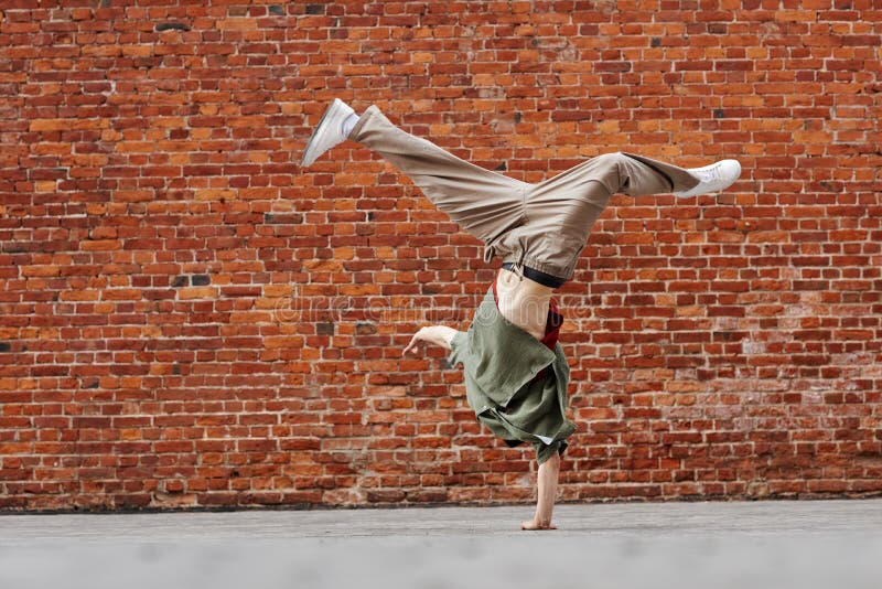 Breakdance Action Pose stock image. Image of young, brick - 258598001