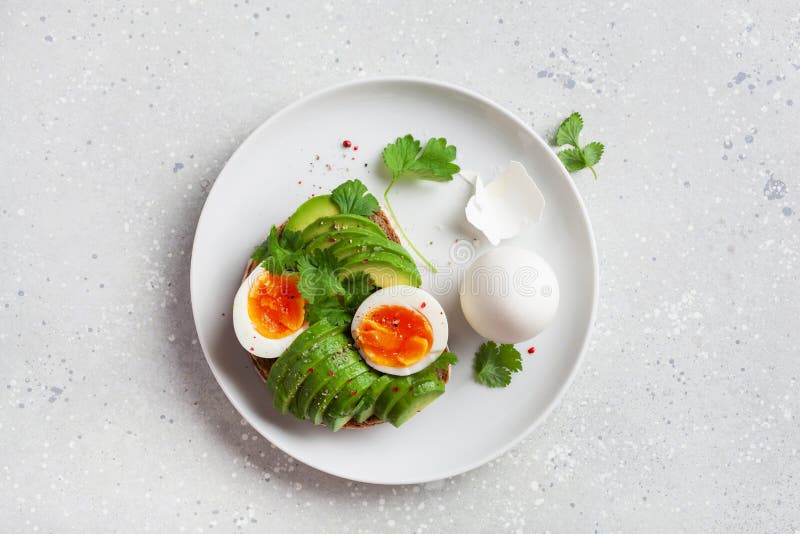 Breakfast Avocado Sandwich with Boiled Egg Stock Photo - Image of ...