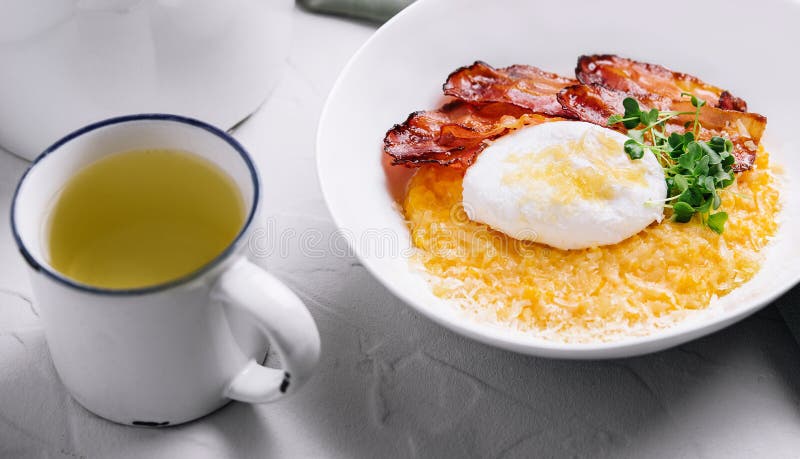 Breakfast Barley Porridge with Bacon and a Poached Egg Stock Photo ...