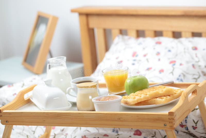 Breakfast on a bed stock photo. Image of dish, wooden - 24397012