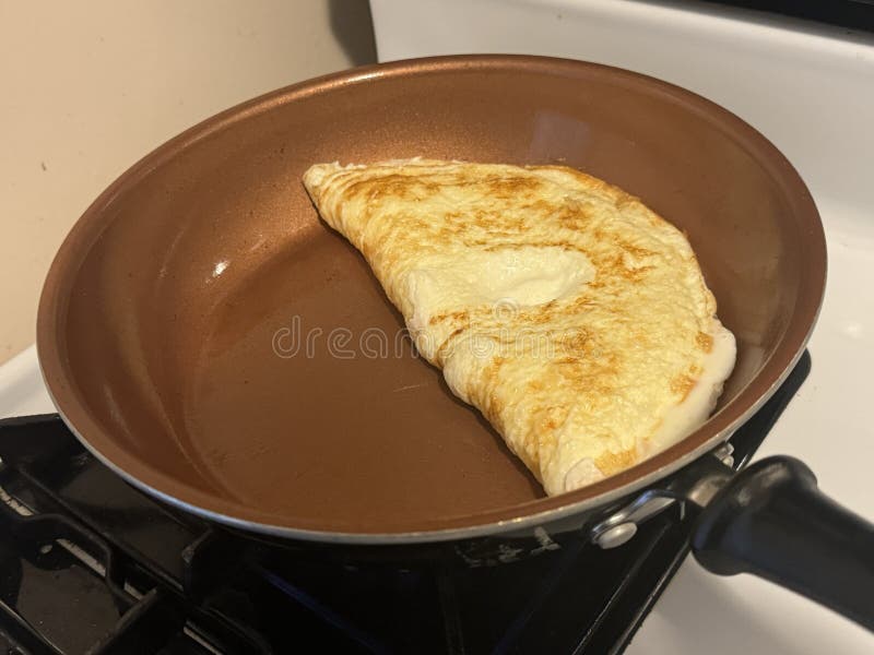 Egg Omelette in a Copper Pan Stock Photo - Image of breakfast, omelette ...