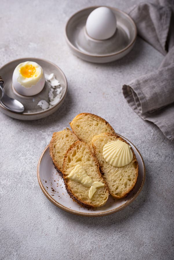 Breakfast with Boiled Eggs, Bread and Butter Stock Photo - Image of ...