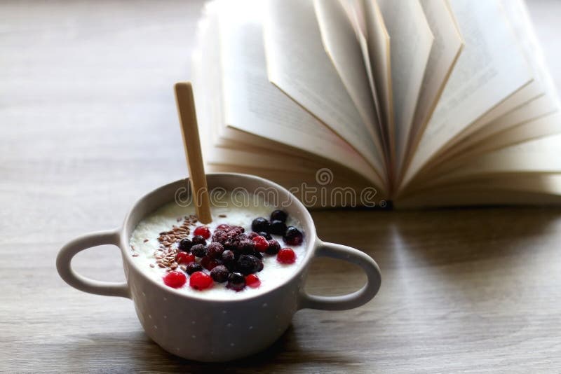 Breakfast and Book stock photo. Image of interior, granola - 180923392