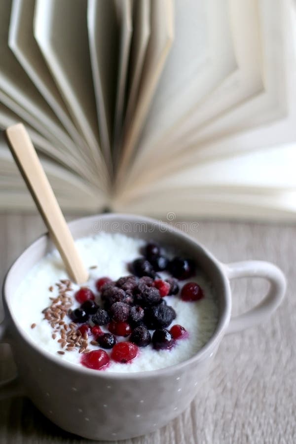 Breakfast and Book stock image. Image of interior, eating - 180923479
