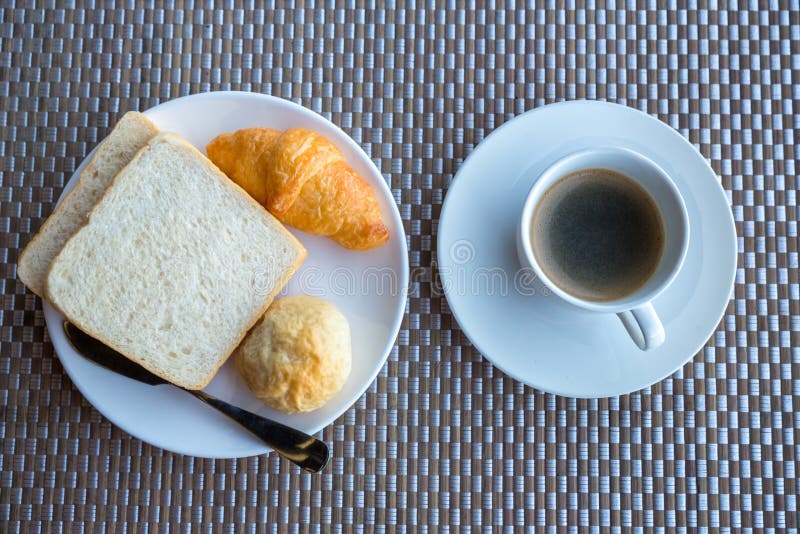 Breakfast with Bread, Croissants and Black Coffee Composition ...