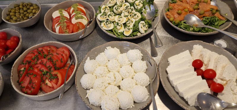 Breakfast Buffet with Different Kinds of Cheese Eggs Tomatoes Olives ...