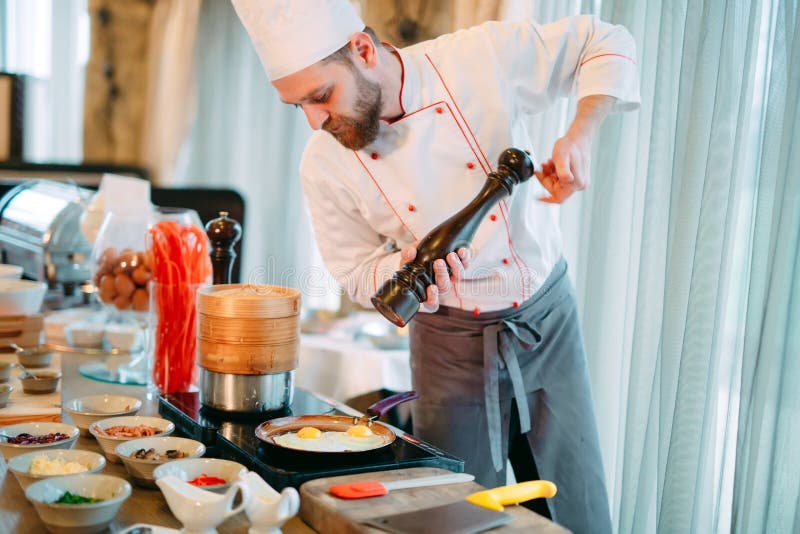 Breakfast. the Chef Prepares Eggs for Breakfast. Stock Photo - Image of ...