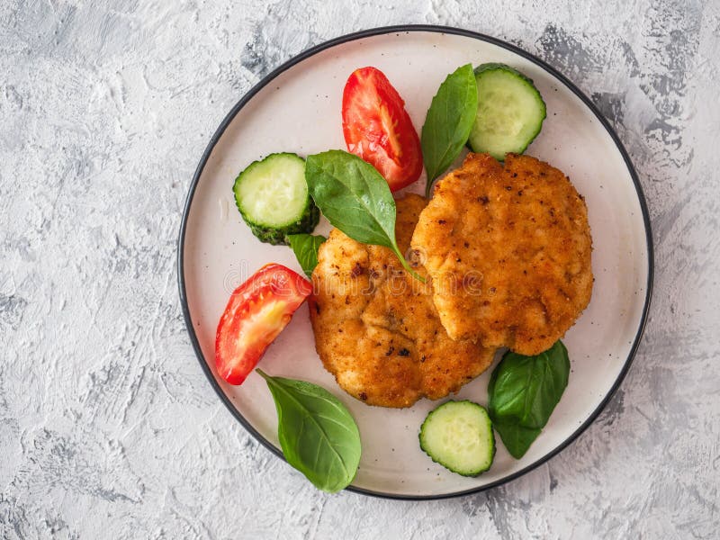 Breakfast with Chicken Steaks and Vegetables, Sliced Tomatoes and ...