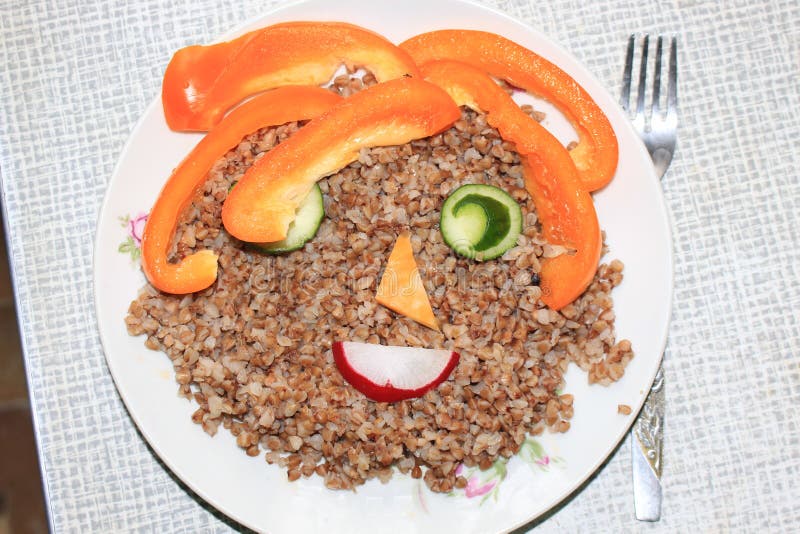 Breakfast for a Child is Decorated in the Form of a Funny Face in a ...