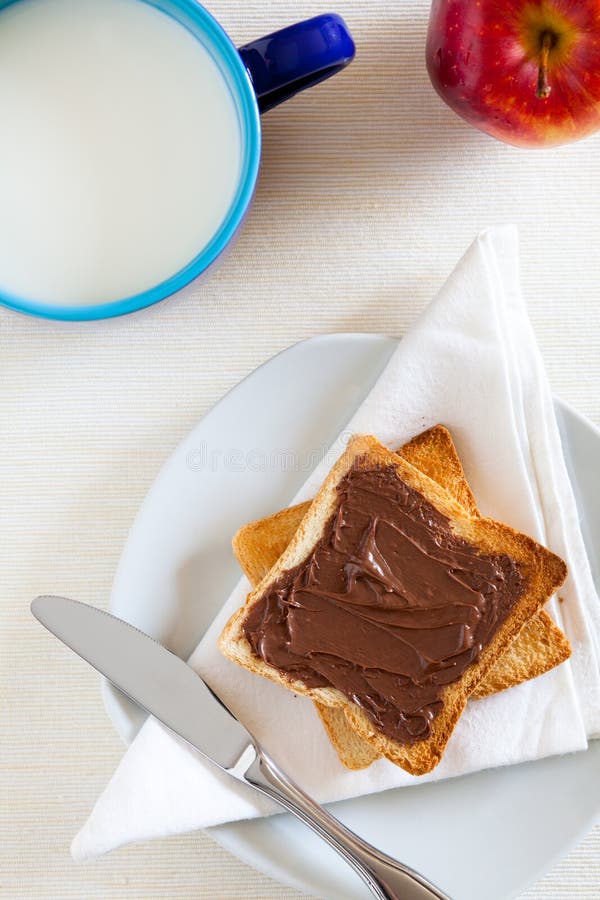 Breakfast with Chocolate Spread on Toast Stock Photo - Image of toast ...