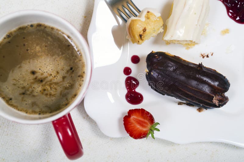 Breakfast with Coffe and Eclair Cake Stock Photo - Image of slice ...