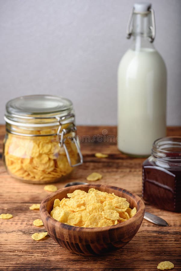 Breakfast with Corn Flakes, Milk and Jam Stock Photo - Image of ...