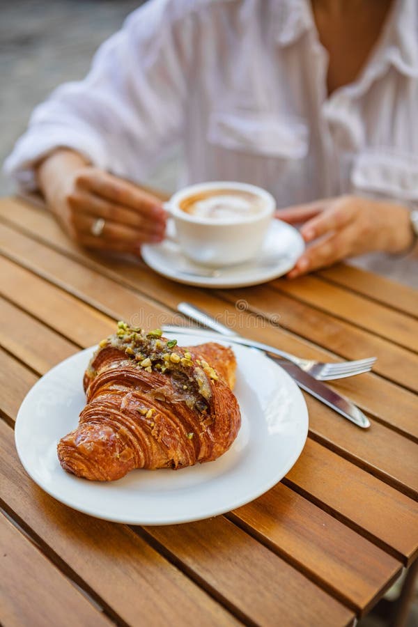 Breakfast with Crunchy Croissants and Coffee on a Terrace in the Summer ...