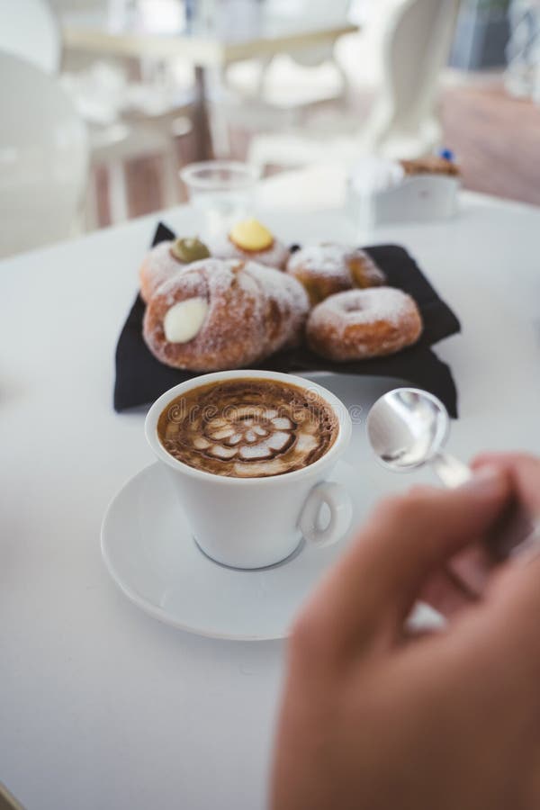 Breakfast with Cup of Coffee and Croissants on a White Table. Front ...
