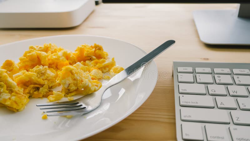 Breakfast on desk. stock photo. Image of documents, desk - 65496196