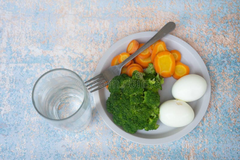 A Breakfast Diet Plate without Rice, Featuring Eggs, Carrots, and ...