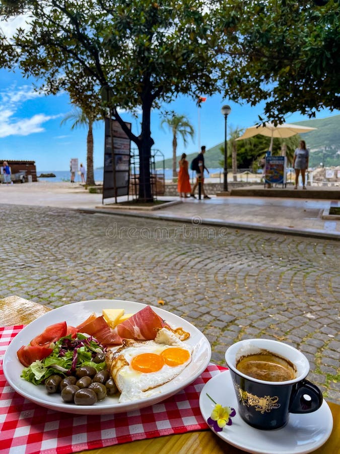Breakfast with Eggs, Bacon, Vegetables and Coffee by the Sea in ...
