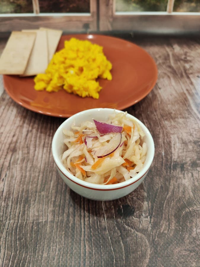 Breakfast with Fermented Cabbage and Red Onion and Scrambled Eggs Stock ...
