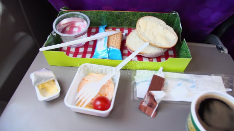 Breakfast Food in Box on Table at Plane, Stock Video - Video of coffee ...