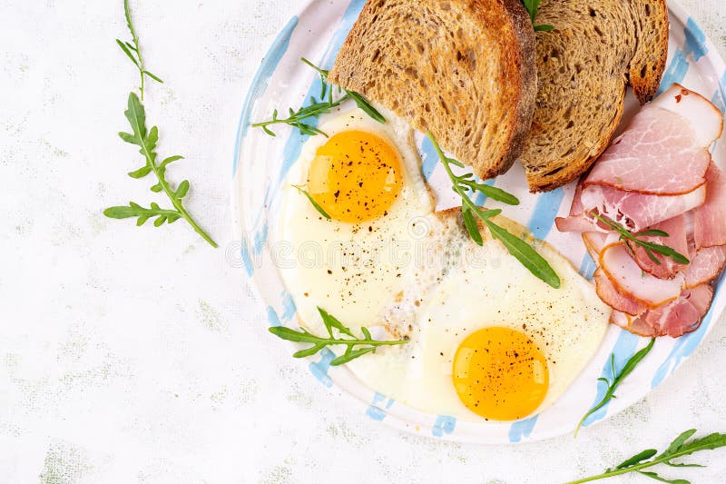 Breakfast. Fried Egg, Slices of Ham and Toasted Bread Stock Image ...