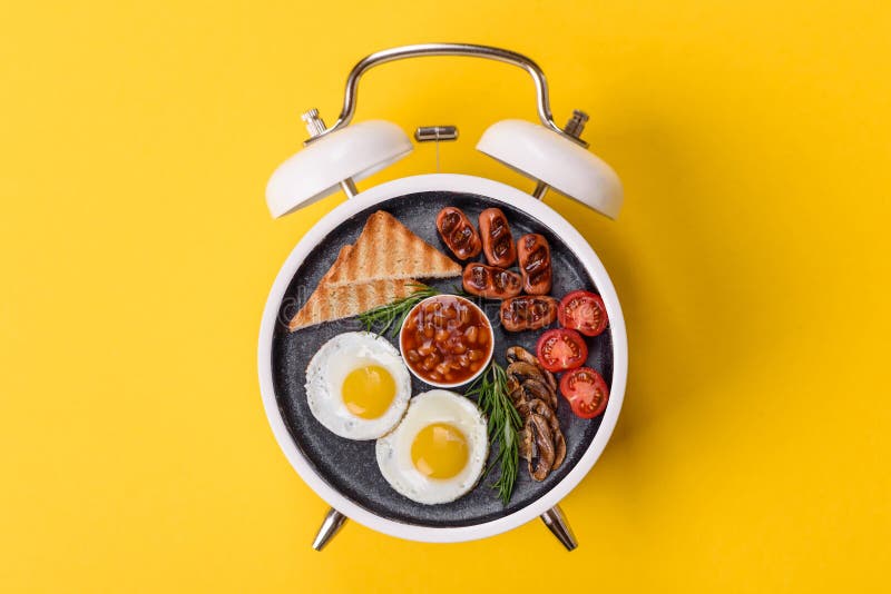 Breakfast of Fried Eggs with Bacon or Sausage and Vegetables. ? Plate ...