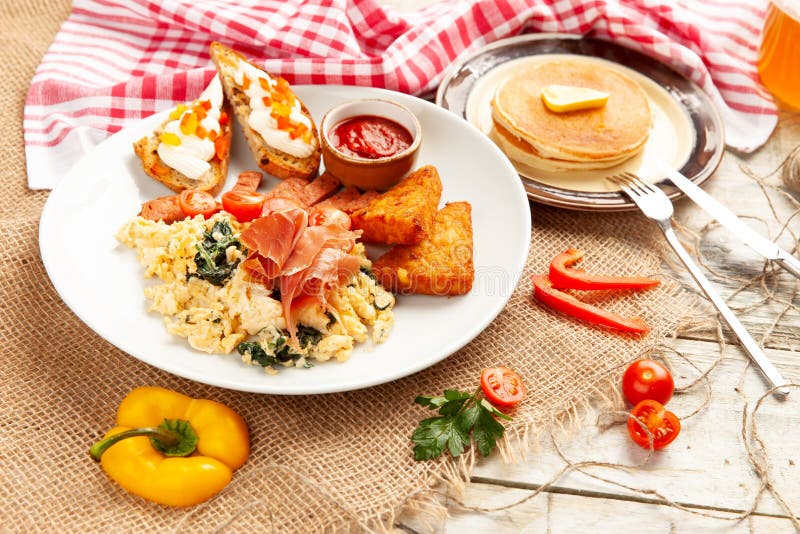 Breakfast. Fried Eggs, Hash Brown and Pancakes Stock Photo - Image of ...