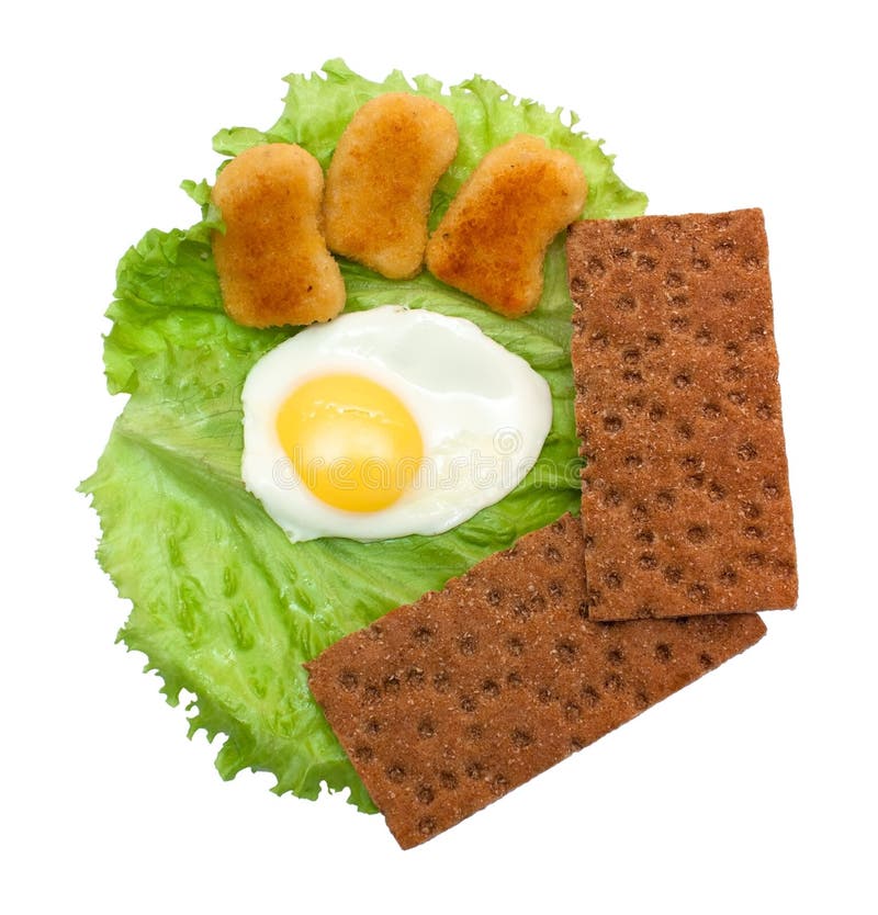 Breakfast: Fried Eggs, Lettuce, Crisp Bread and Nuggets Stock Image ...