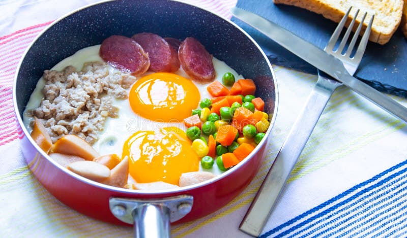 Breakfast fried eggs stock image. Image of food, vegetable - 210271527