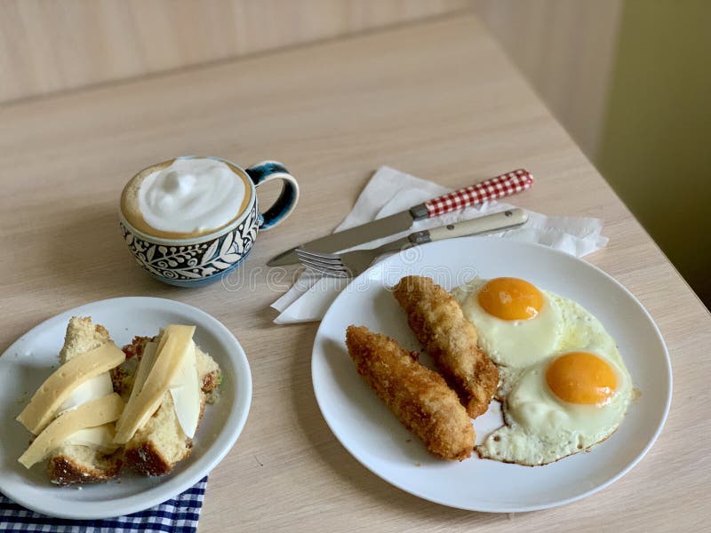 Breakfast with Fried Eggs and Nuggets Stock Photo - Image of cappuccino ...