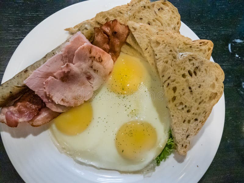 Breakfast of Ham, Egg, Bacon, Sausage and Toast Stock Photo - Image of ...