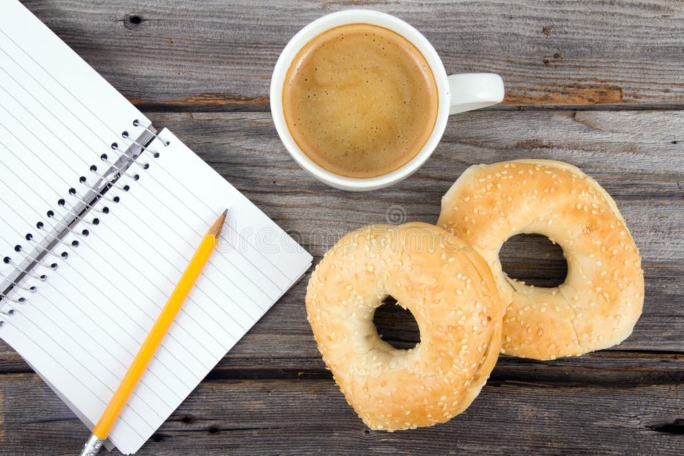 Breakfast and note book stock photo. Image of work, angle - 70086346