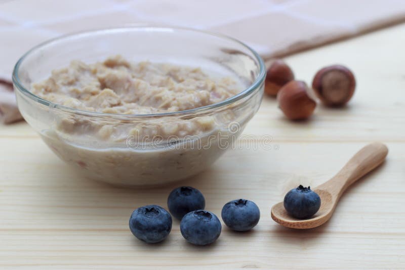 Breakfast with Oat Flakes and Hazelnut Nuts Stock Image - Image of ...