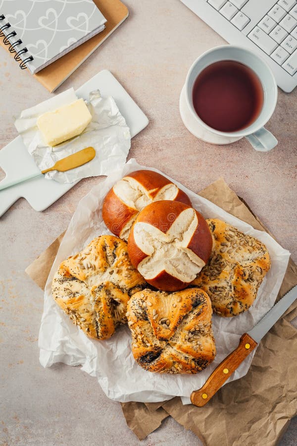 Breakfast at Office Workplace, Fresh Bread Rolls with Butter and Cup of ...