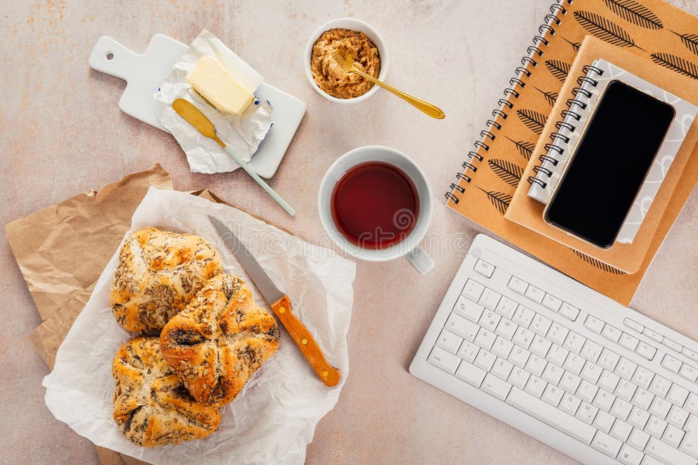 Breakfast at Office Workplace, Fresh Bread Rolls with Butter and Cup of ...