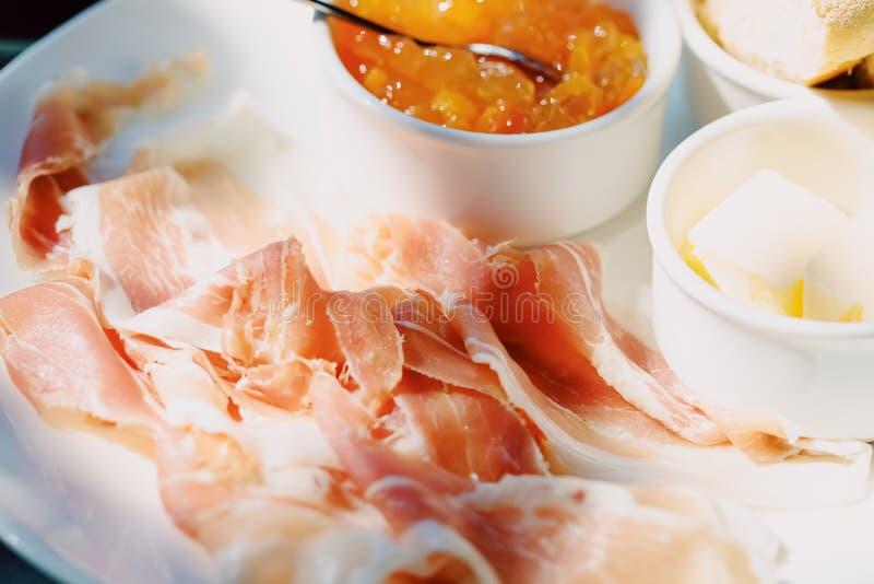 Breakfast Outdoors in Summer, Ham, Jam, Butter and Ham Stock Photo ...
