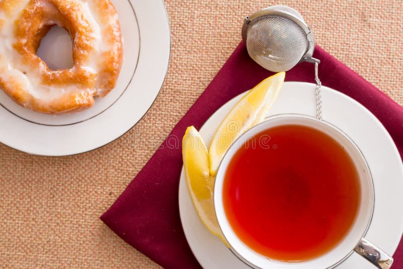 Breakfast with Pastries, and Hot Tea with Lemon. Stock Photo - Image of ...