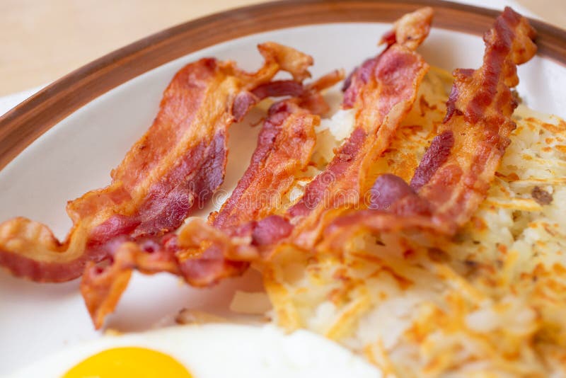 Breakfast plate feat bacon stock image. Image of table - 192749653