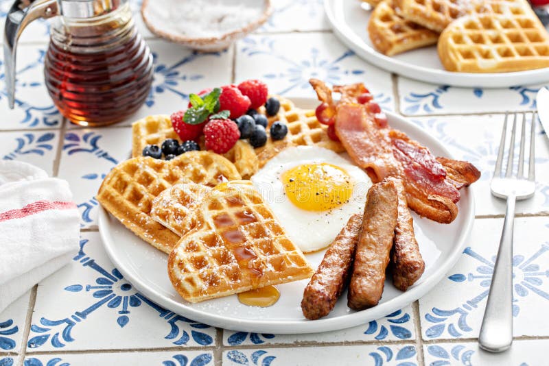 Breakfast Plate with Waffles, Fried Egg, Bacon and Sausage Stock Image ...