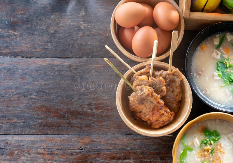Breakfast with Pork Roast with Boiled Eggs and Rice Gruel Stock Image ...