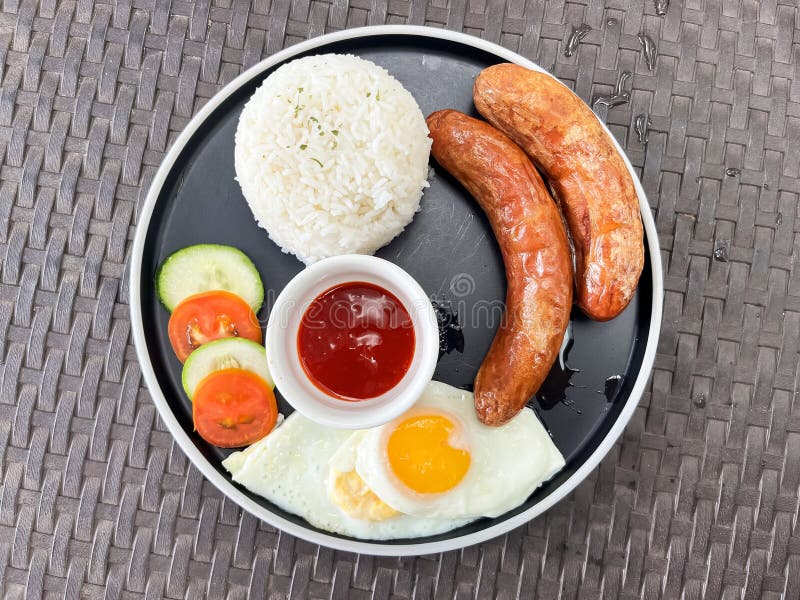 Breakfast with Rice, Fried Eggs and Fried Sausage Stock Photo - Image ...