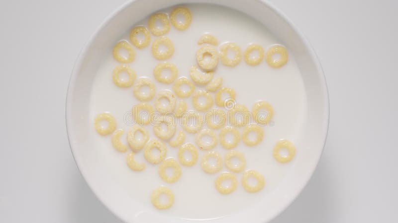 Breakfast Ring Cornflakes in a Milk in a White Bowl on the Table, Top ...