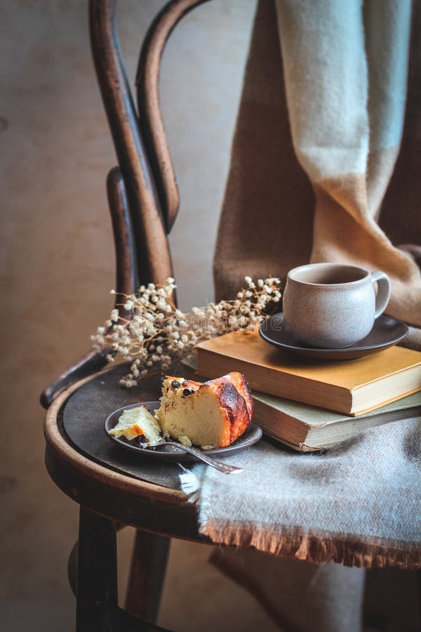 Breakfast on a Rustic Chair with a Cup of Coffee and a Piece of Cake ...