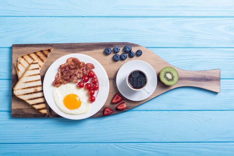 Breakfast on rustic table stock photo. Image of hotel - 125545420