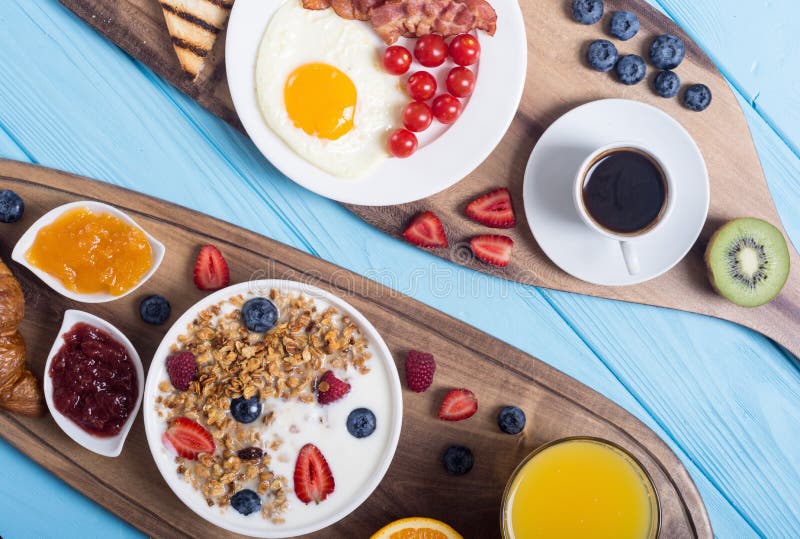 Breakfast on rustic table stock image. Image of glass - 125537595